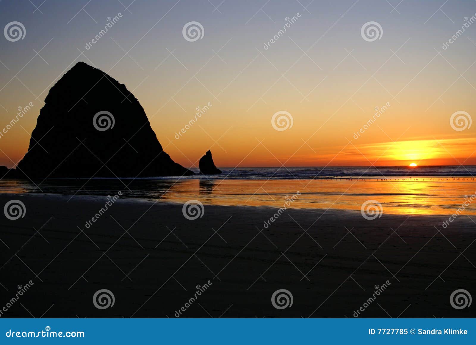 Haystack Rock at Sunset stock image. Image of reflection - 7727785