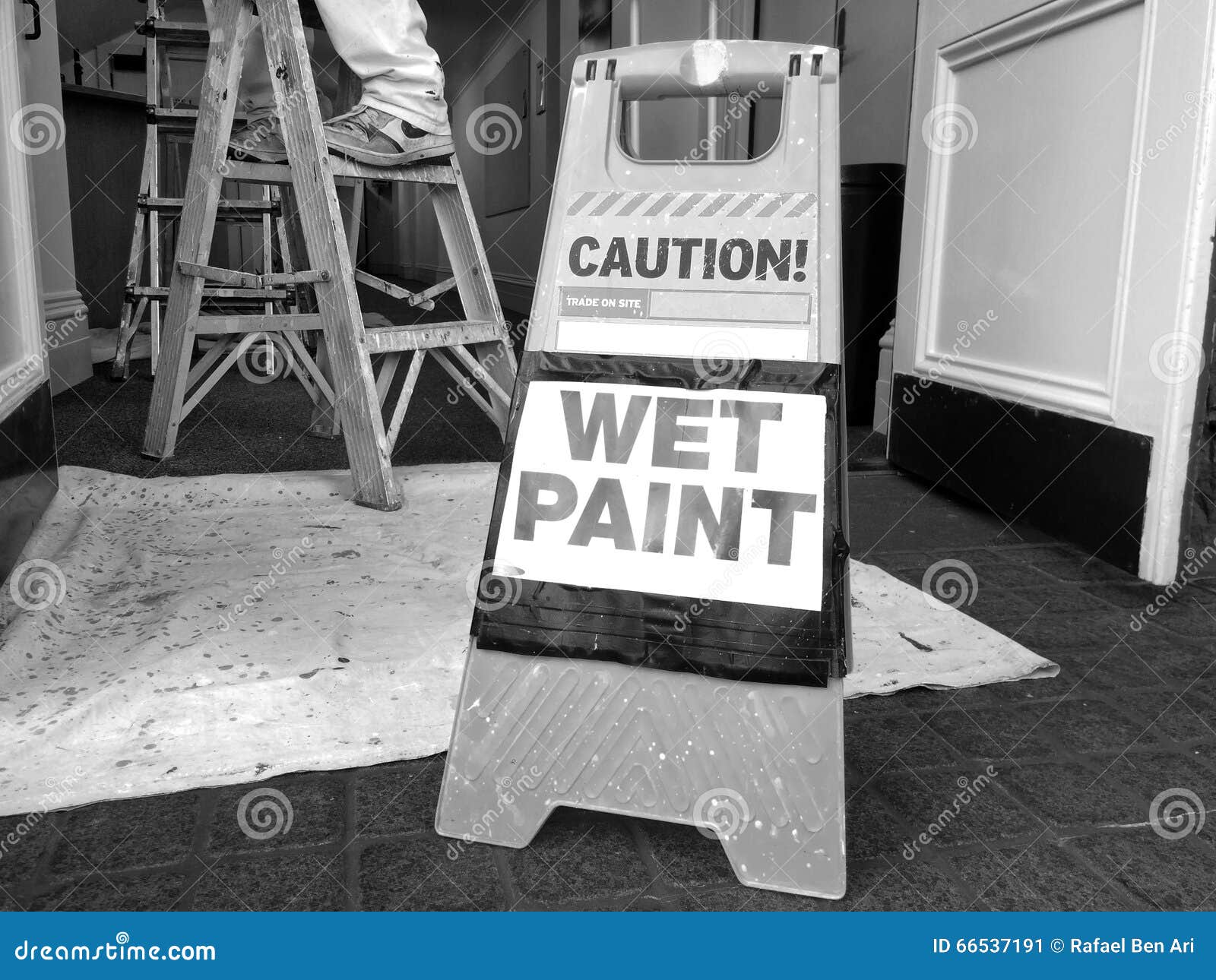 CAUTION: WET PAINT Sign Is Taped Onto A Park Bench Royalty-Free Stock ...