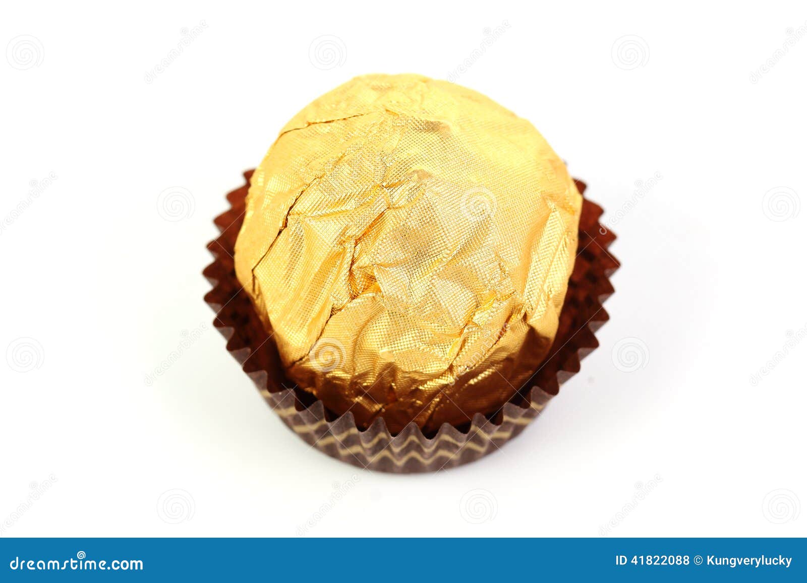Hazelnut Chocolate Wrapped in Golden Foil Stock Photo - Image of studio ...