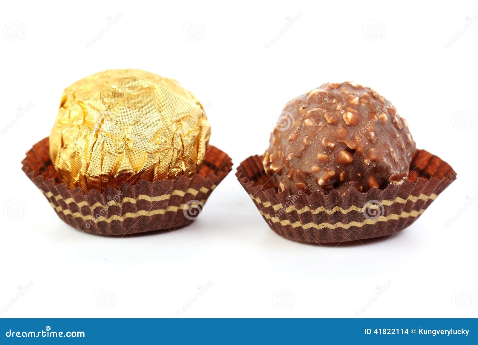 Hazelnut Chocolate Wrapped in Golden Foil Stock Photo - Image of shape ...