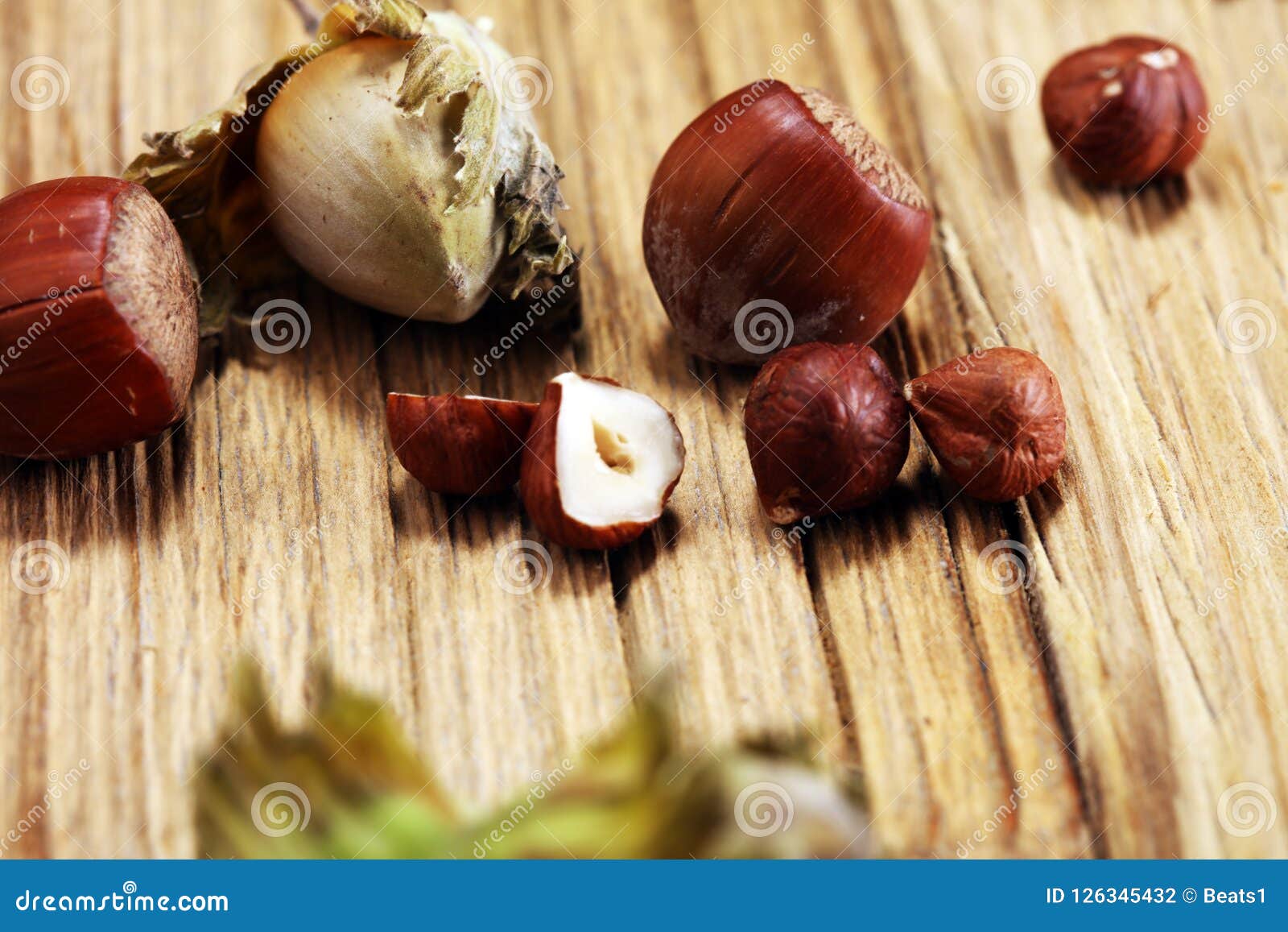 Hazelnut with Shell and Craked and Hazelnut Leaves. Stock Photo - Image ...