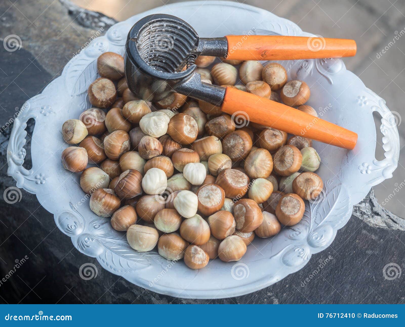 Hazelnuts on a Metallic Plate Stock Photo - Image of close, grass: 76712410