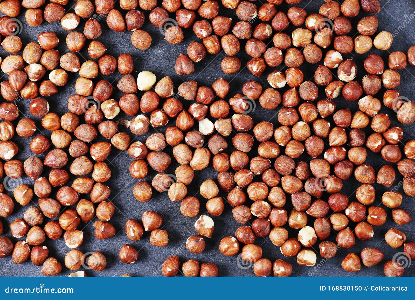 Hazelnuts in a small tray stock photo. Image of natural - 168830150