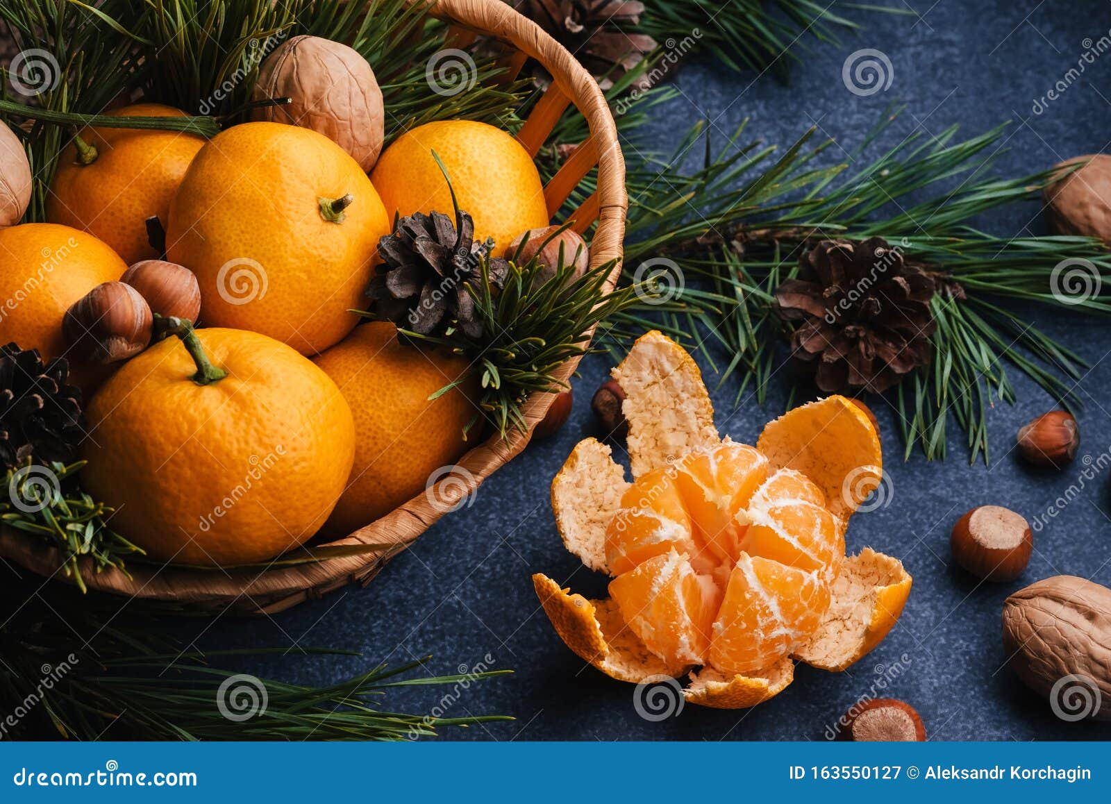 Hazelnuts, Walnuts and Tangerines Decorated with Christmas Branches and ...
