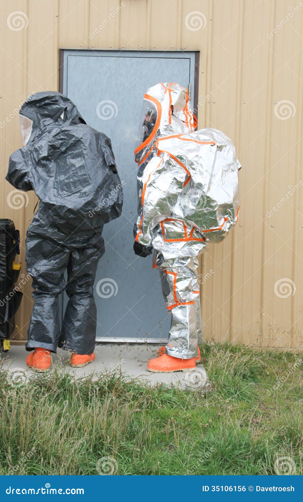 Hazmat team opening door stock photo. Image of protective - 35106156