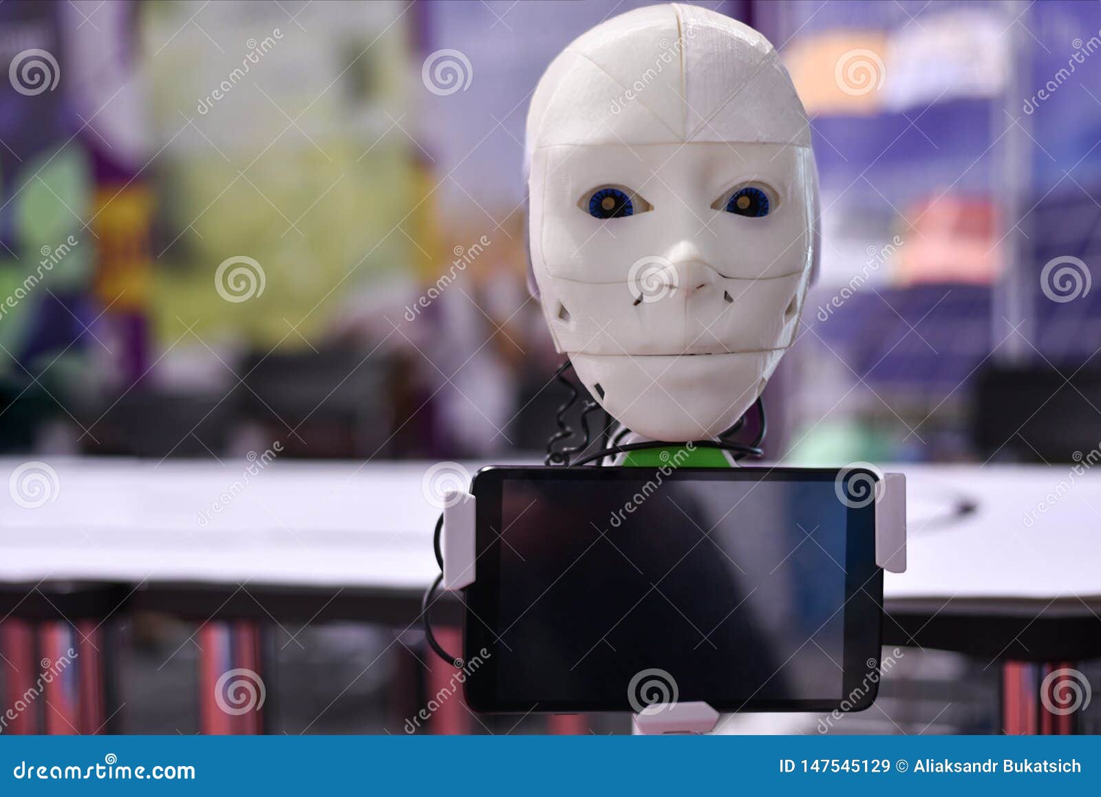 The Head of the Android Robot Communicates with the Person through the ...