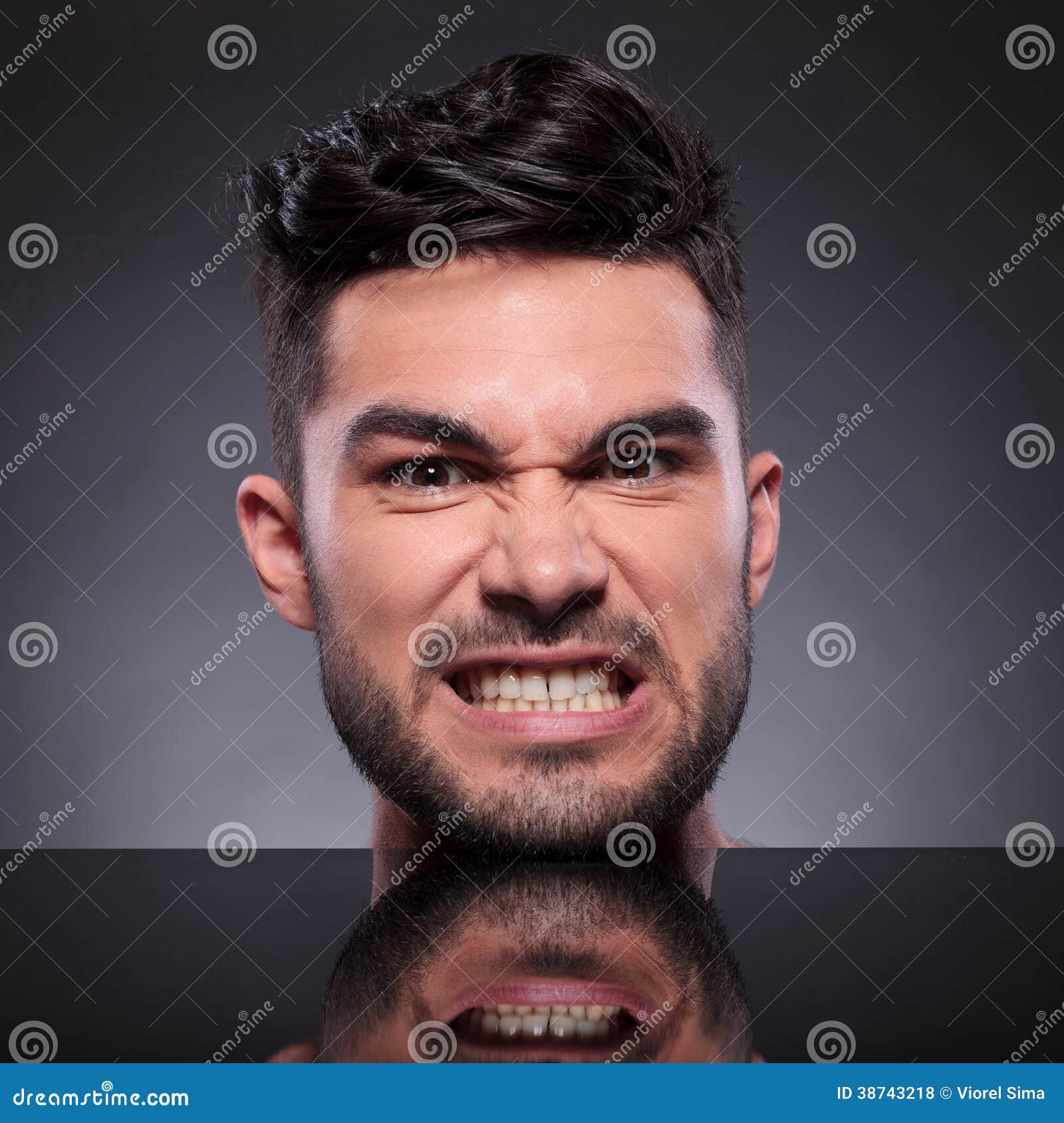 Head of angry young man stock photo. Image of head, desk - 38743218