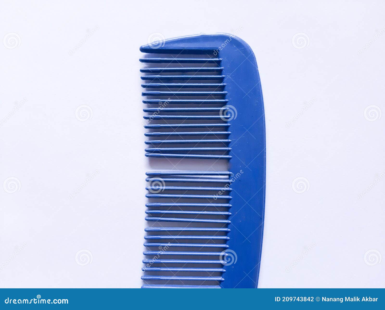 Head of Blue Plastic Comb for Hair with White Background Stock Photo ...