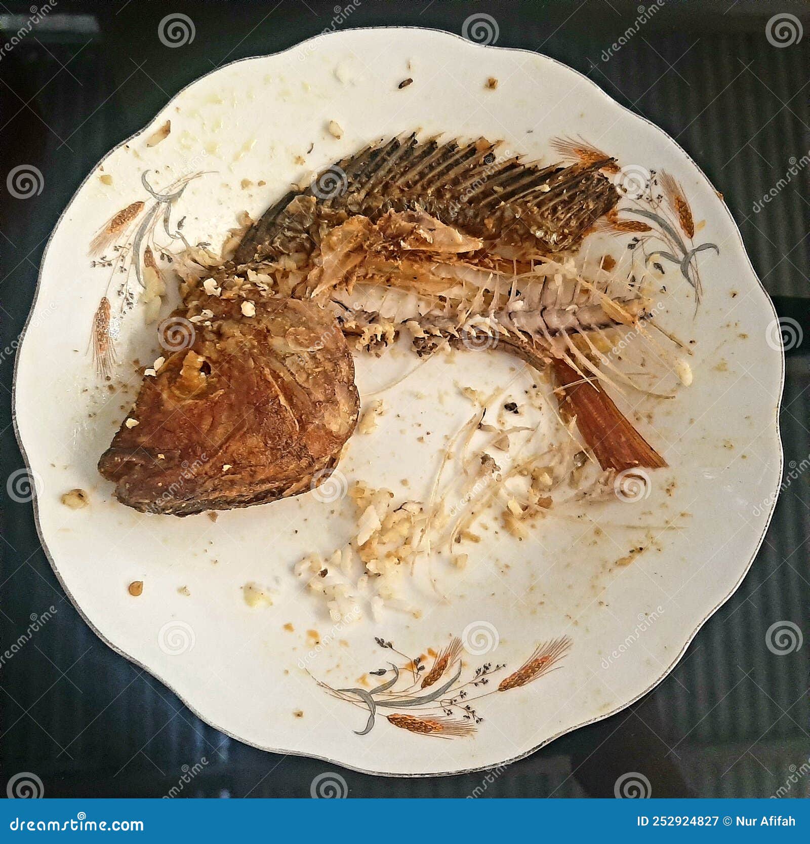 Head Bone Fish on the Plate Stock Image - Image of food, plate: 252924827