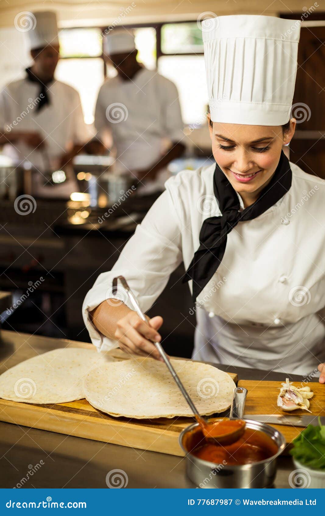 Head Chef Spreading Sauce on a Pizza Stock Image - Image of restaurant ...