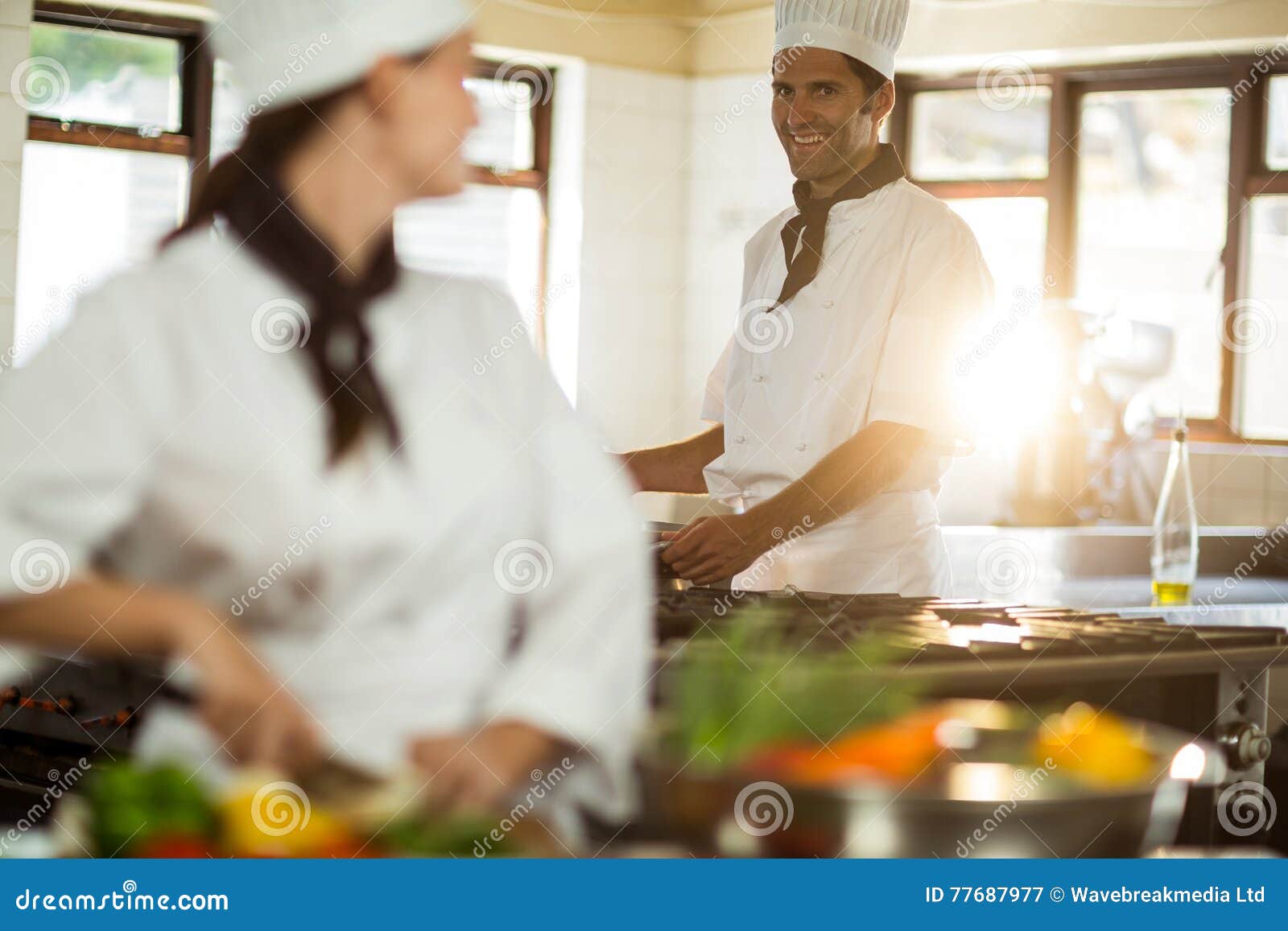 Head Chef Working with Colleague Stock Image - Image of preparation ...