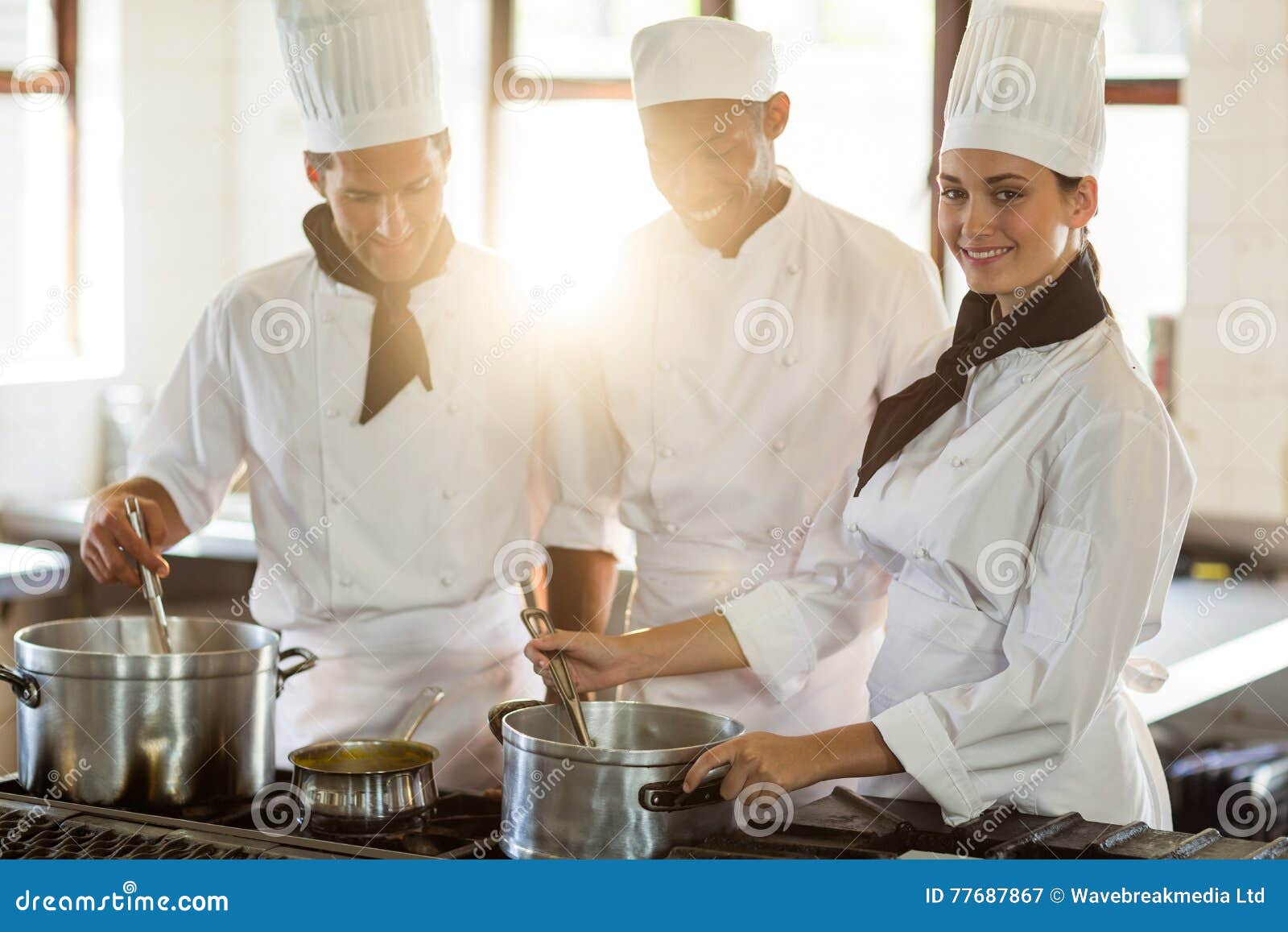 Head Chef Working Together with Her Colleague Stock Image - Image of ...