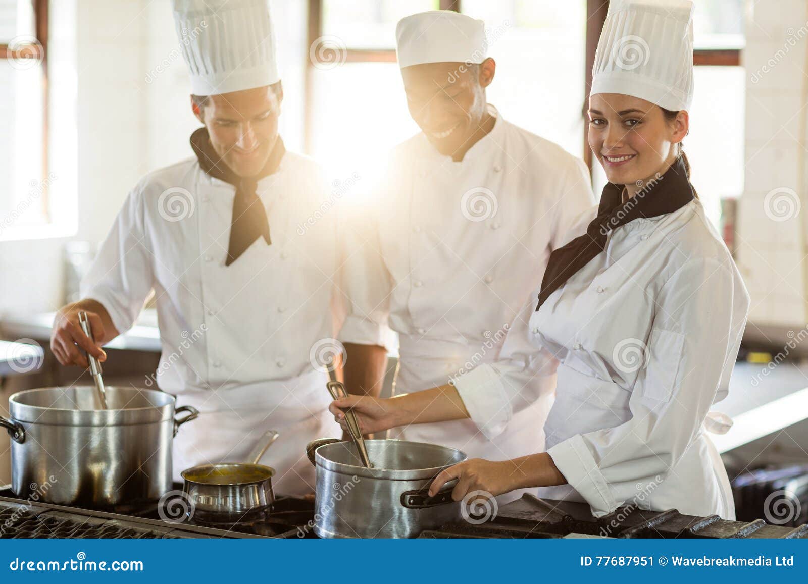 Head Chef Working Together with Her Colleague Stock Image - Image of ...