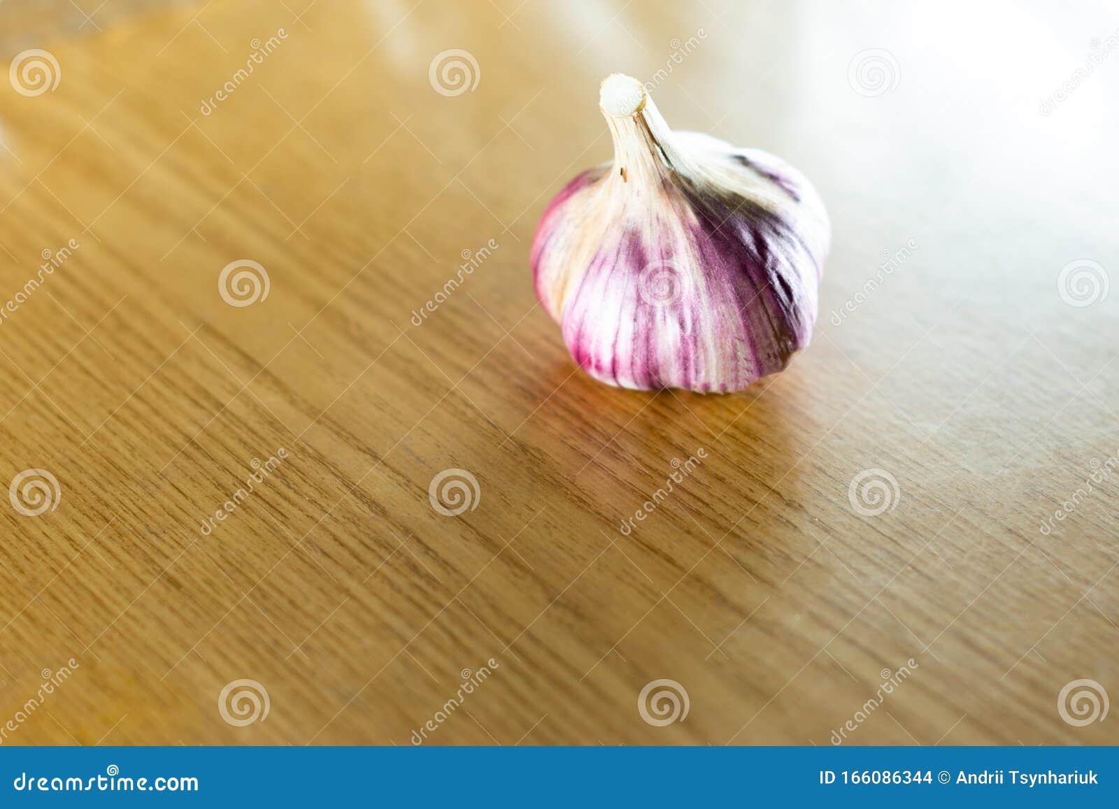 Head of Dried Blue Garlic on a Brown Background Stock Photo - Image of ...
