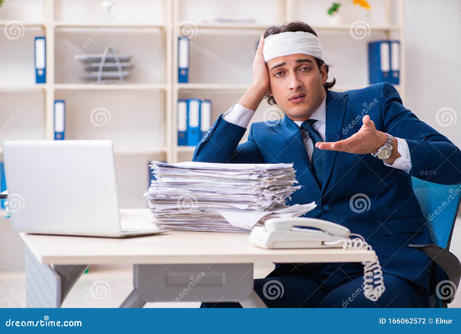Head Injured Male Employee Working in the Office Stock Photo - Image of ...