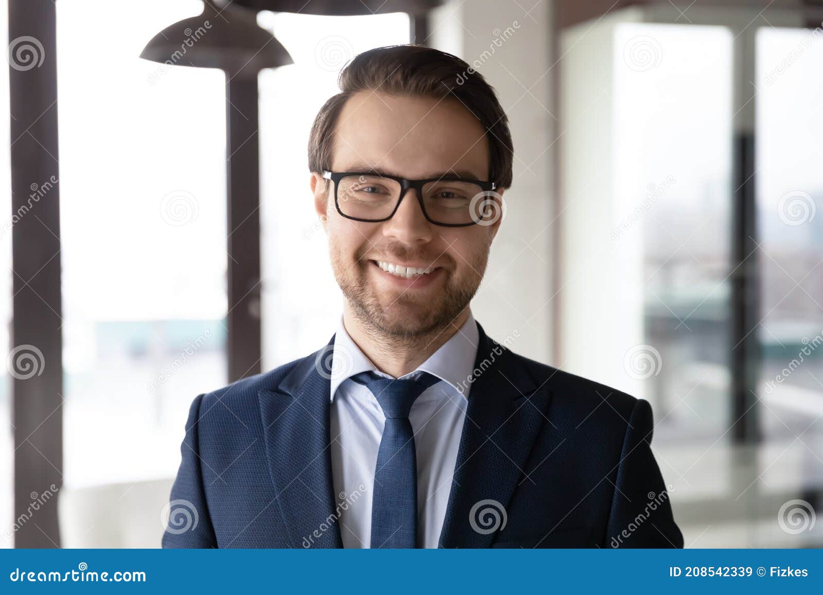 Head Shot Portrait Smiling Confident Businessman Wearing Glasses In