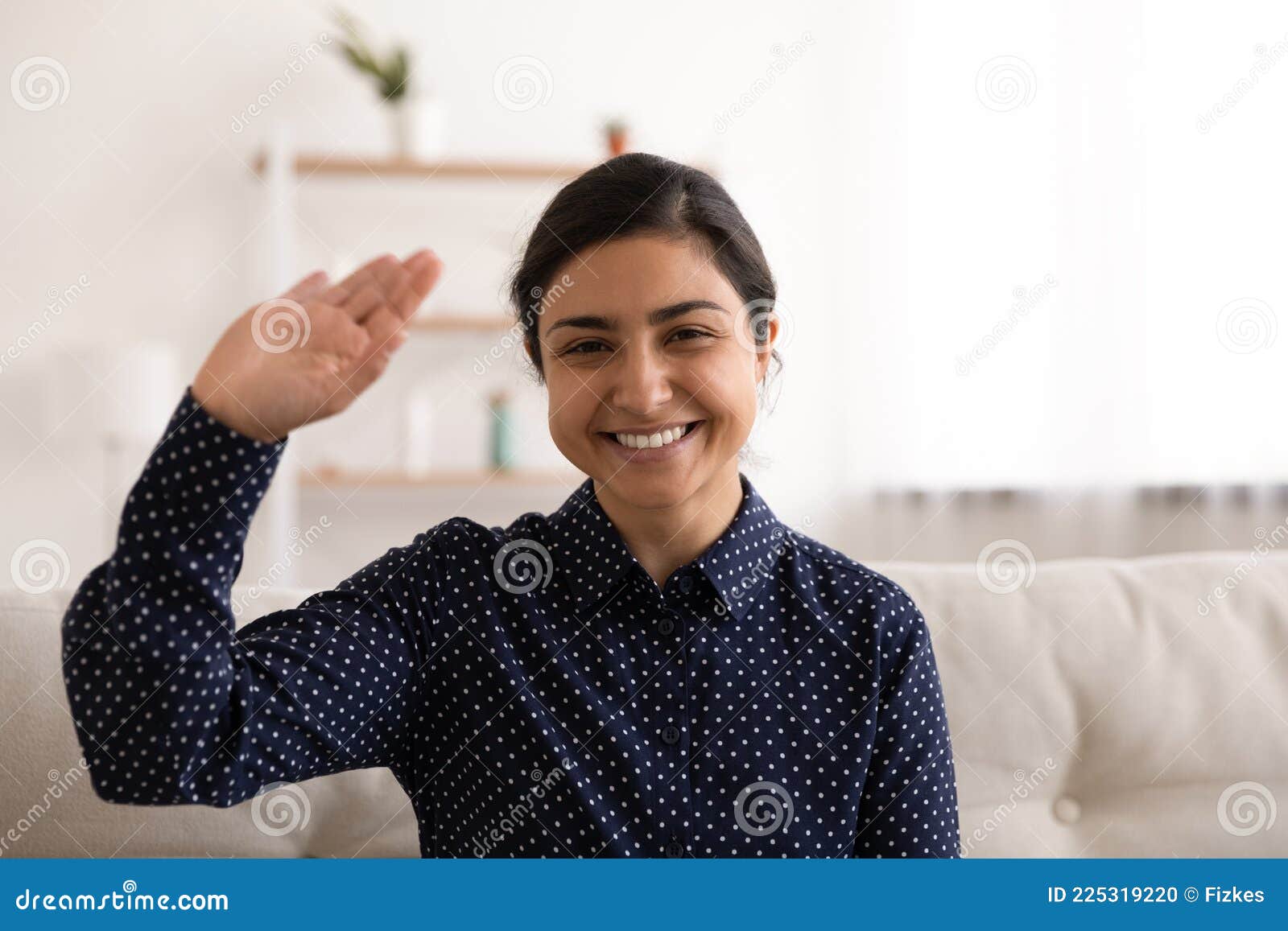 Head Shot Portrait Smiling Indian Woman Waving Hand At Camera Stock