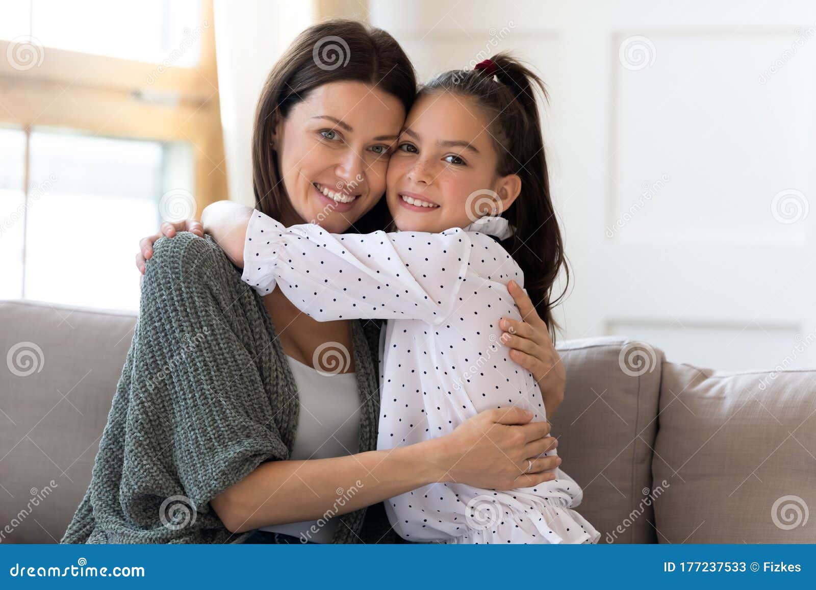 Head Shot Portrait Young Attractive Mother Cuddling School Aged