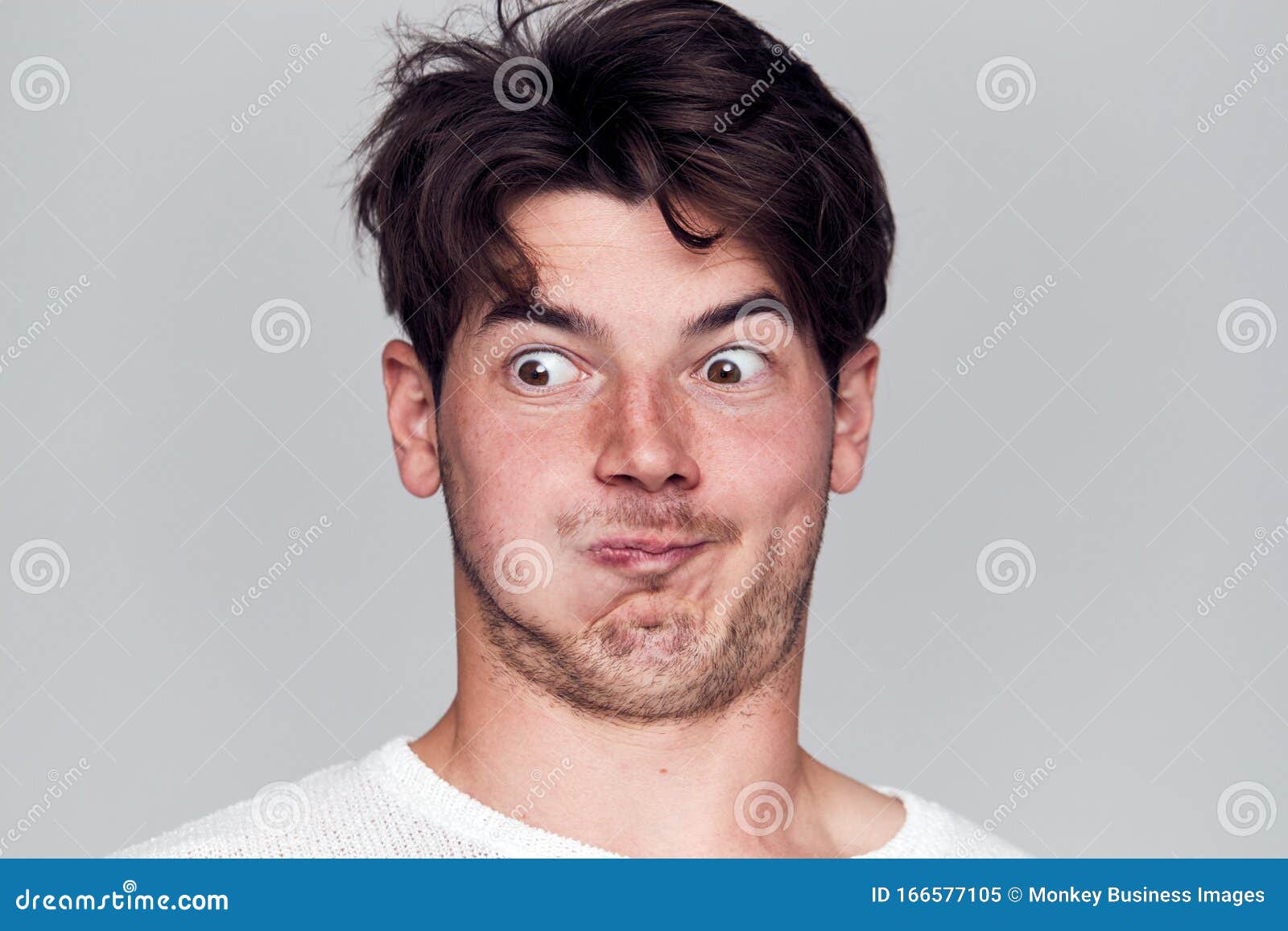 Head and Shoulders Studio Shot of Man Pulling Faces and Smiling at ...
