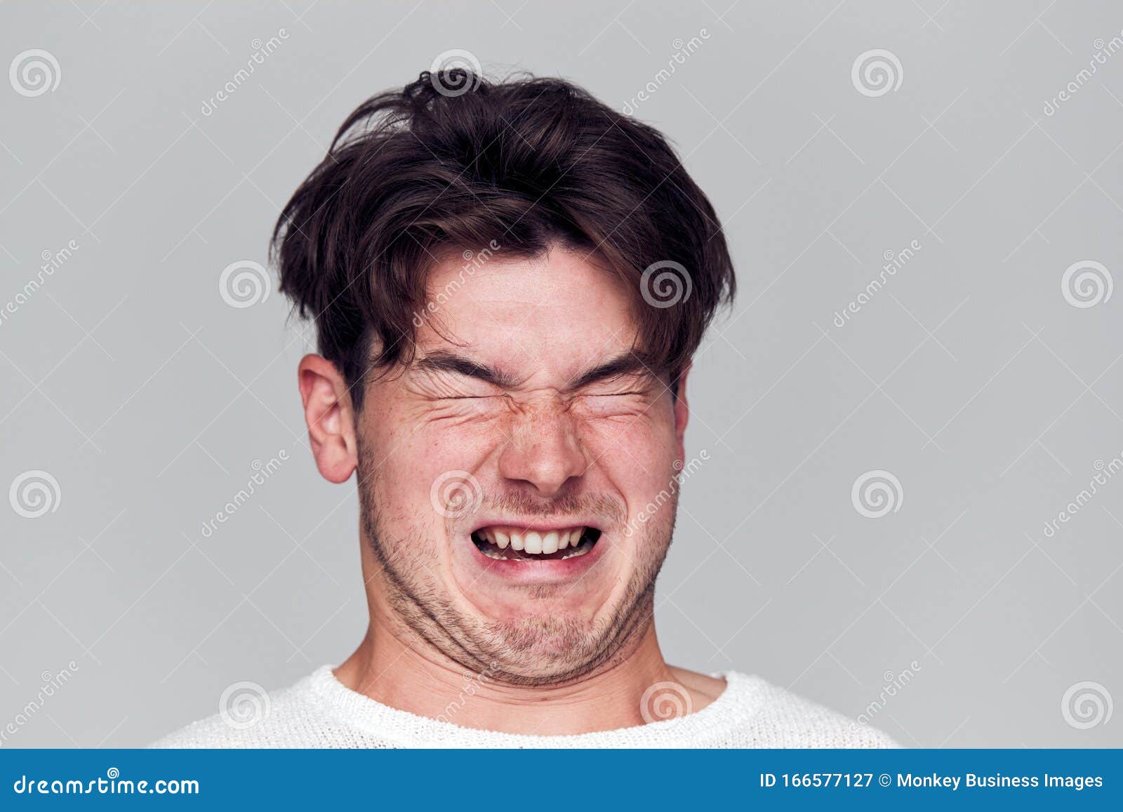 Head and Shoulders Studio Shot of Man Pulling Faces and Smiling at ...