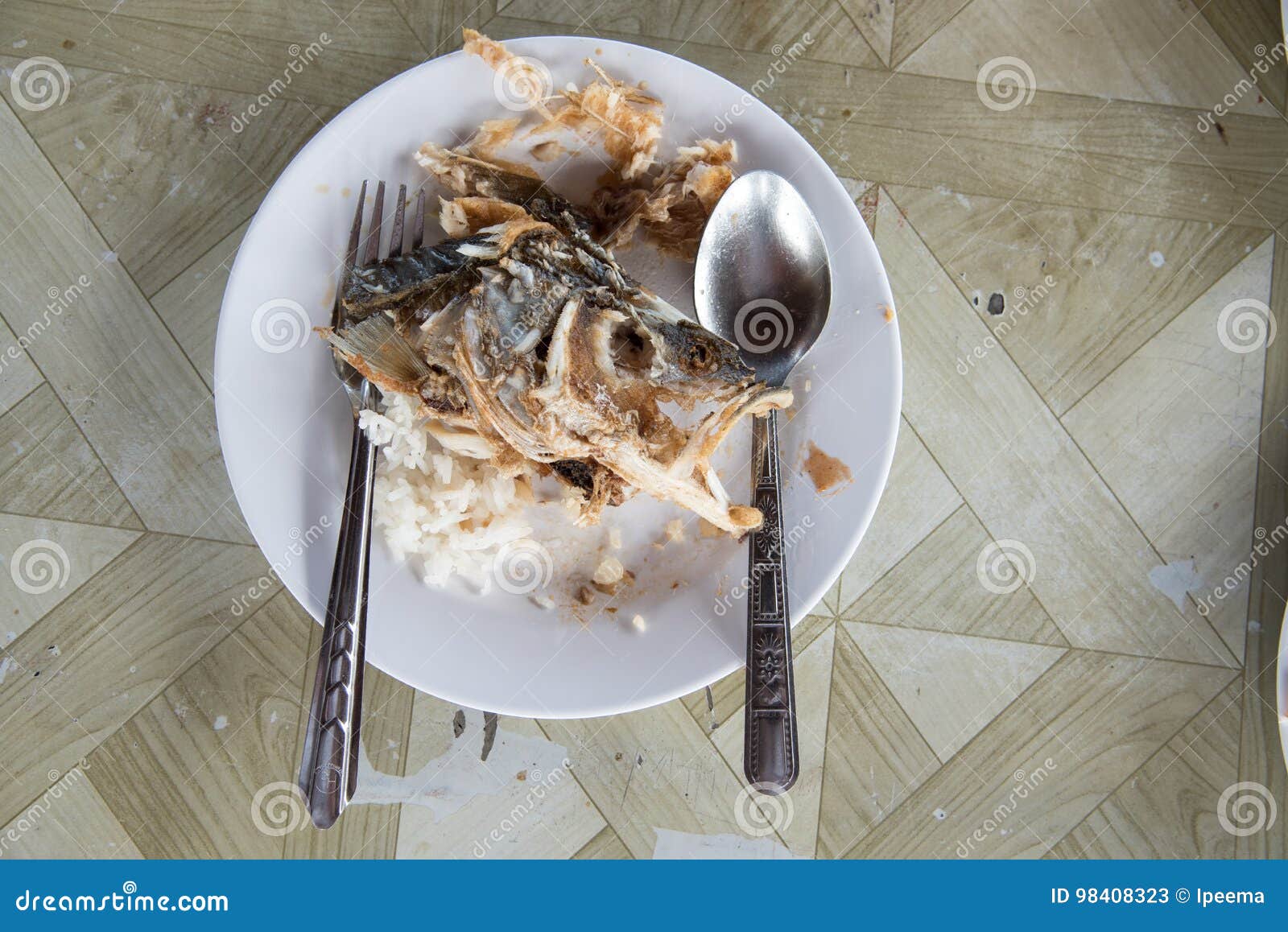 Head Skeleton of Fried Fish on Dish, it`s Delicious Food Stock Image ...