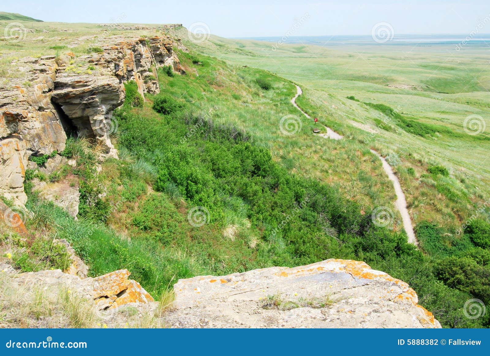 Head-smashed-in Buffalo Jump Stock Photo - Image of buffalo, hunters ...