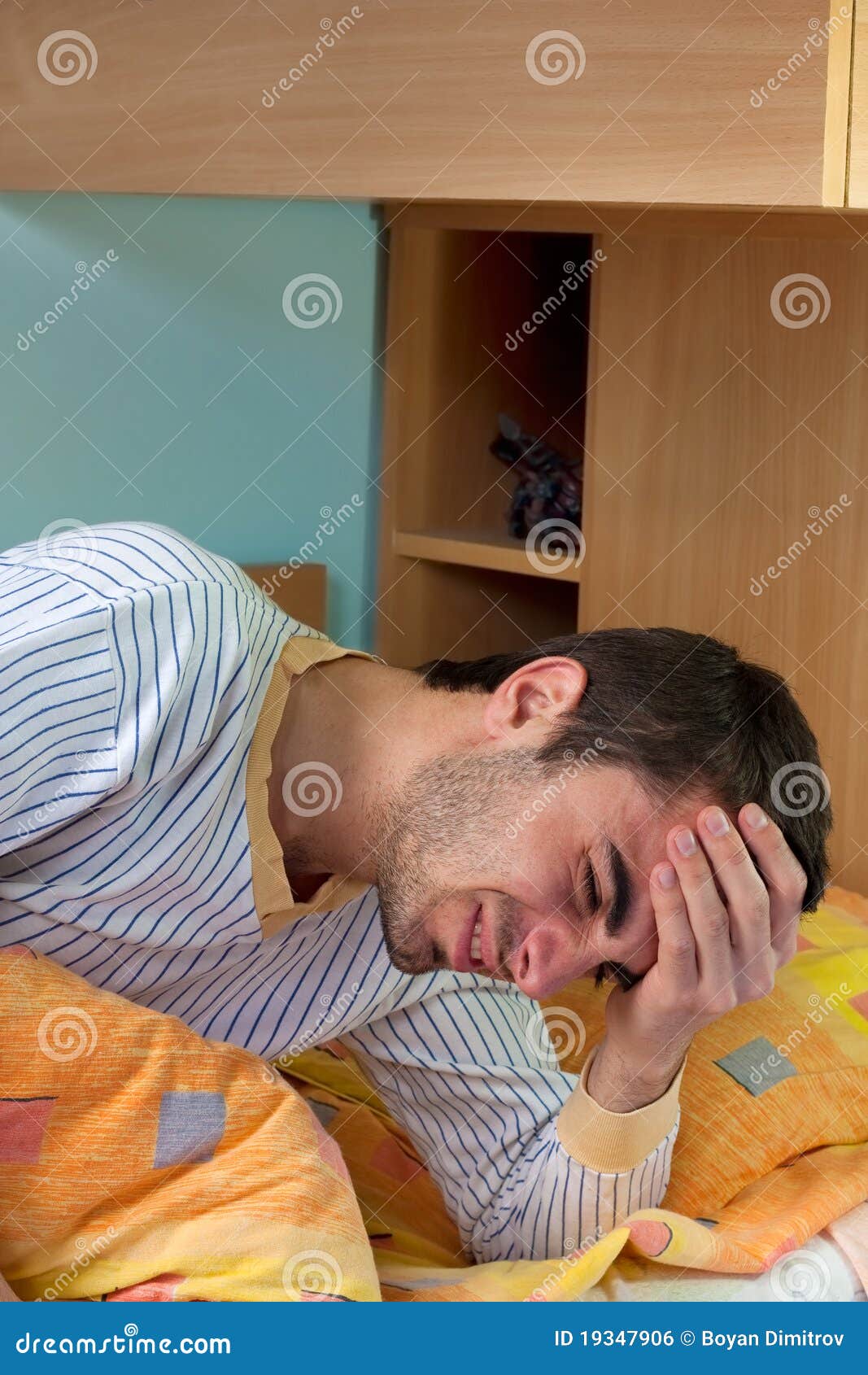 Headache in the morning stock photo. Image of frowning - 19347906