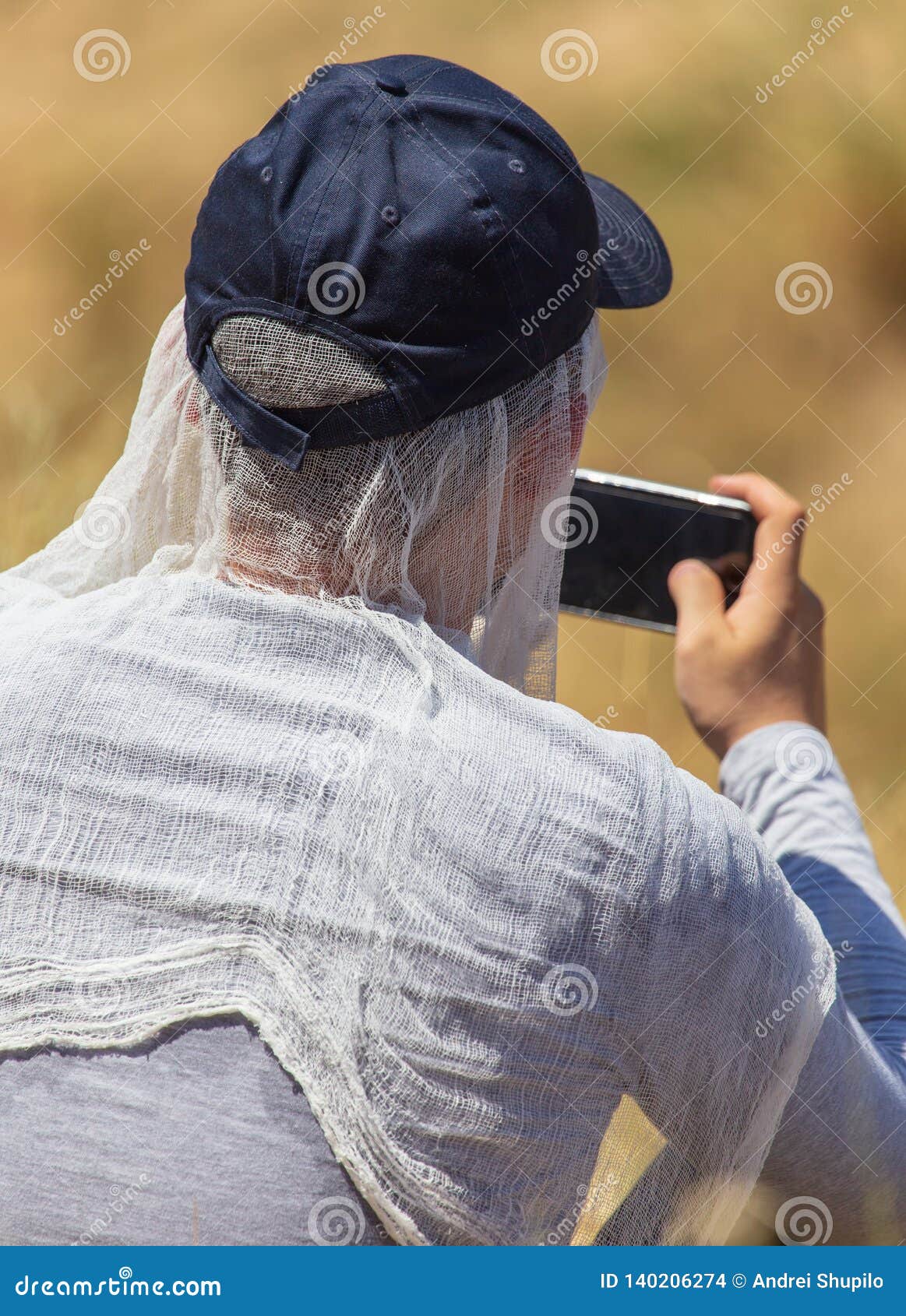 Headgear from the Sun and the Heat of a Man Stock Photo - Image of ...