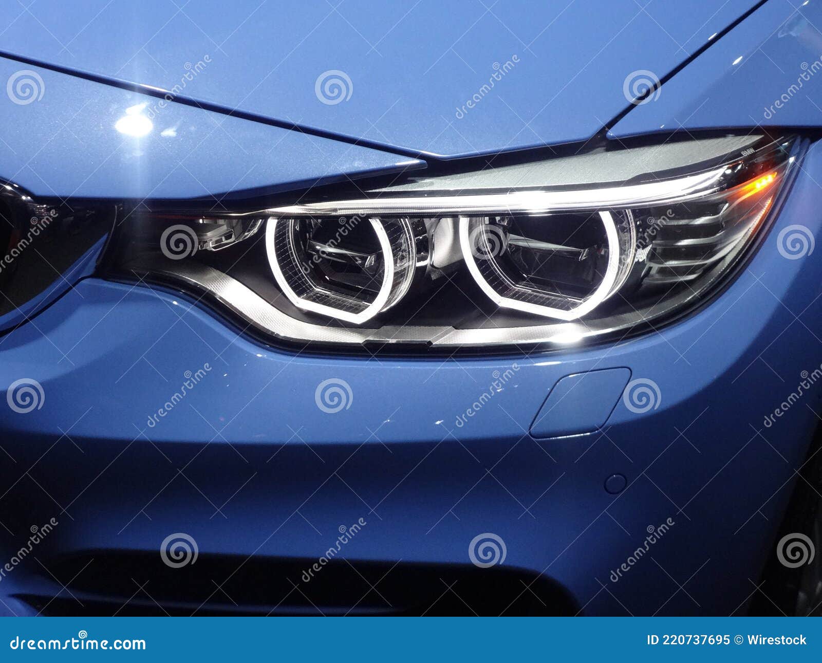 Headlight of a blue car stock image. Image of motorcar - 220737695