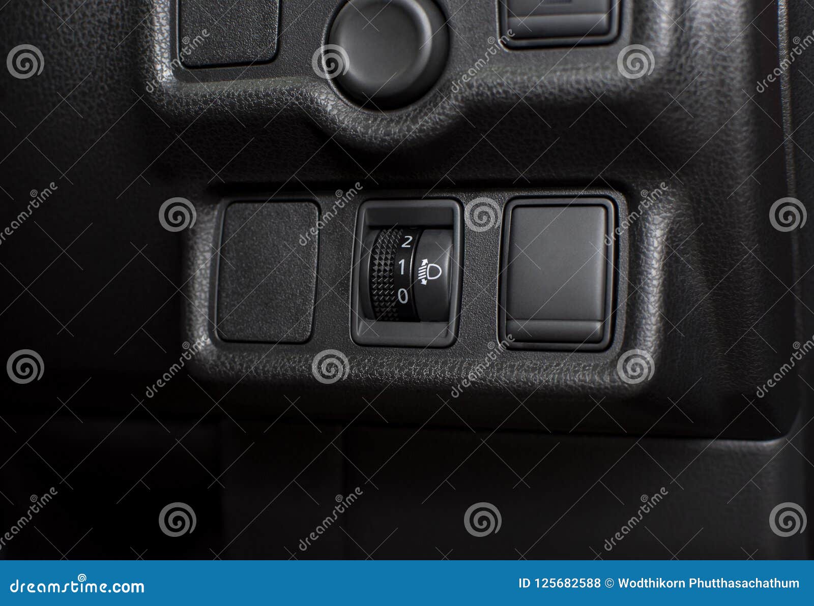 Headlight Level Switch on a Panel of Car. Stock Photo - Image of level ...