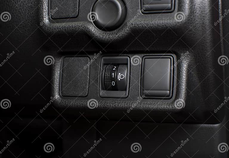 Headlight Level Switch on a Panel of Car. Stock Photo - Image of level ...