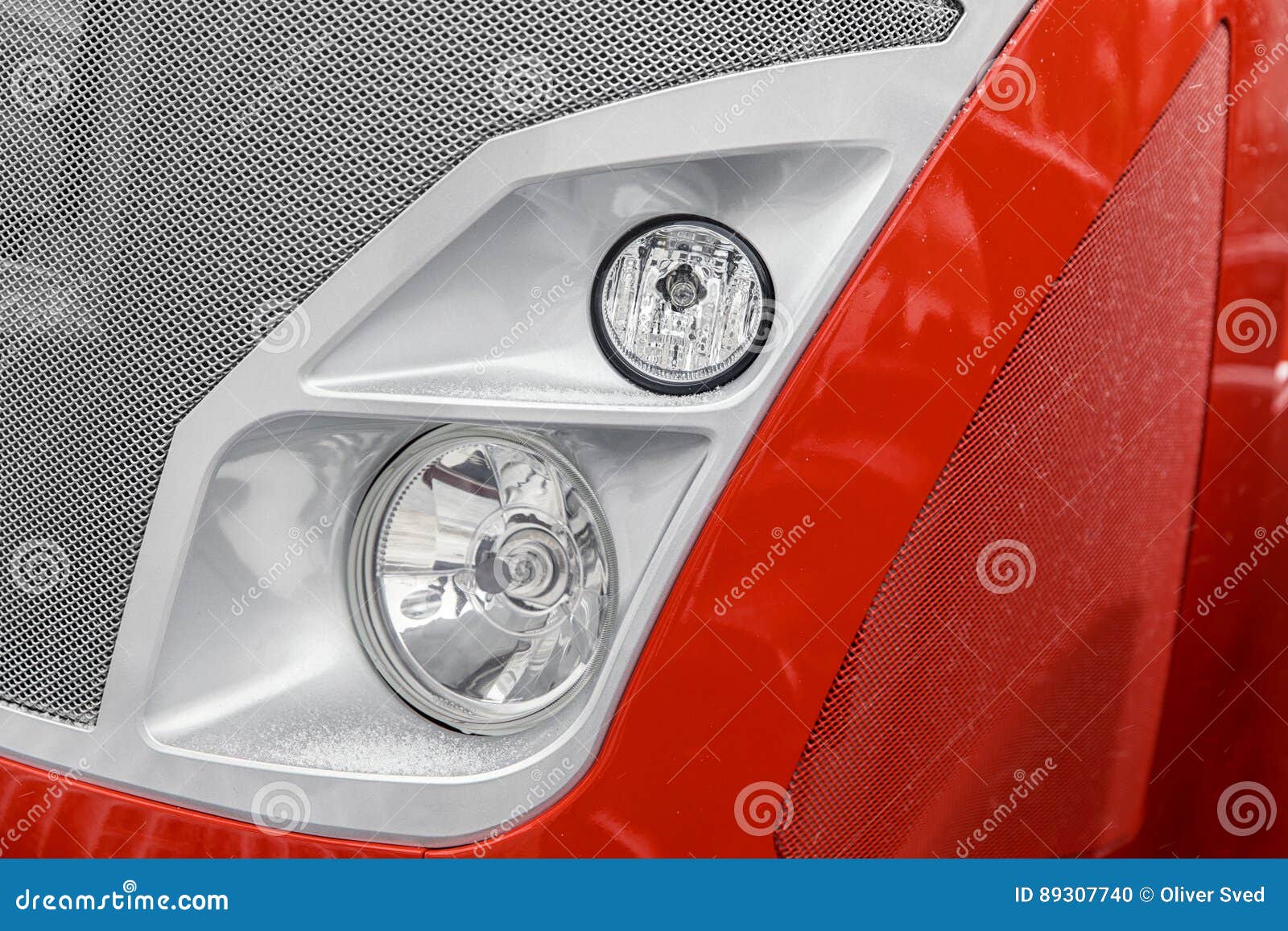 Headlight of a red car stock photo. Image of vehicle - 89307740