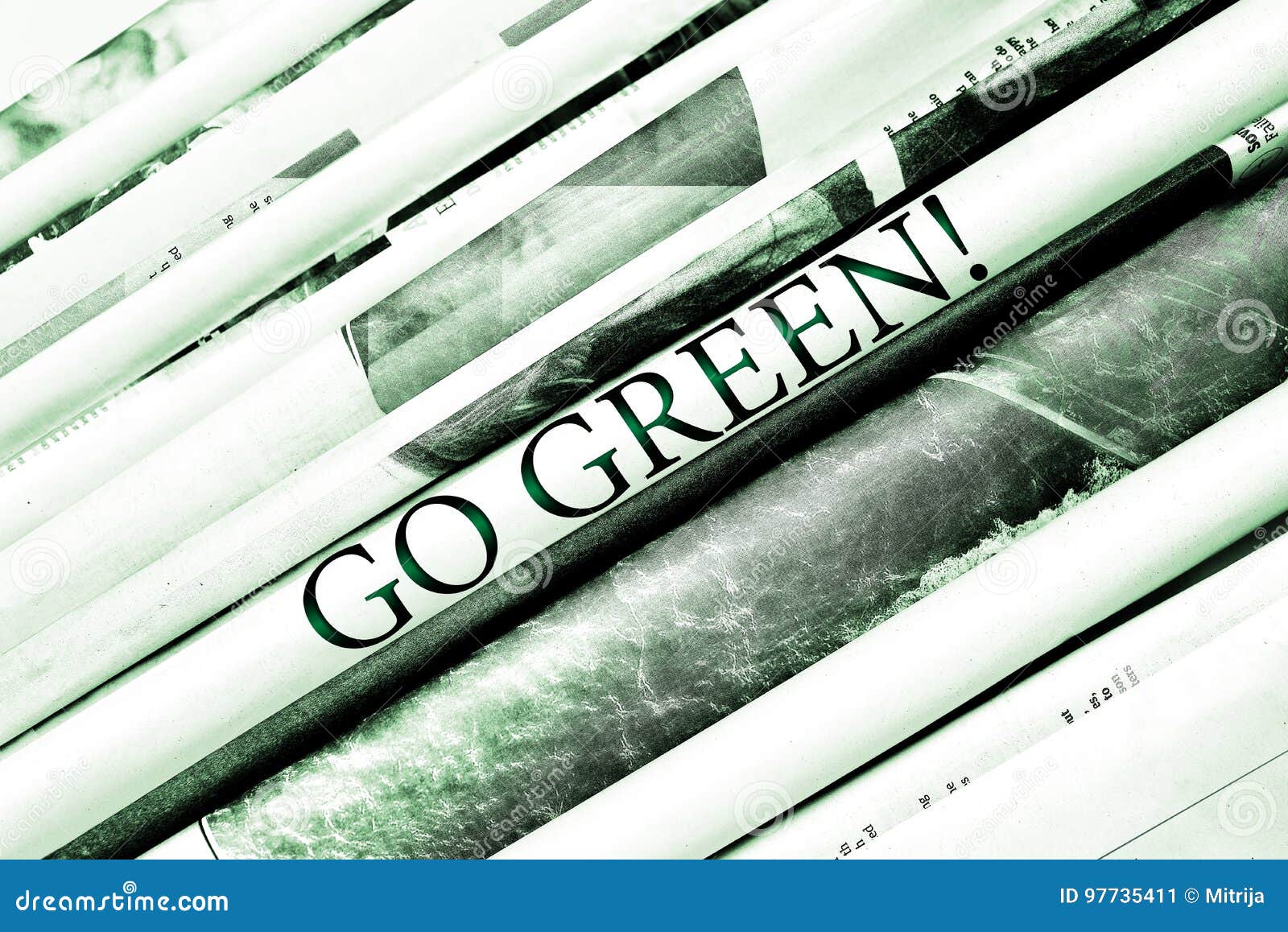Headline â€œGo Green!â€ Over Folded Newspapers Stock Image - Image of ...