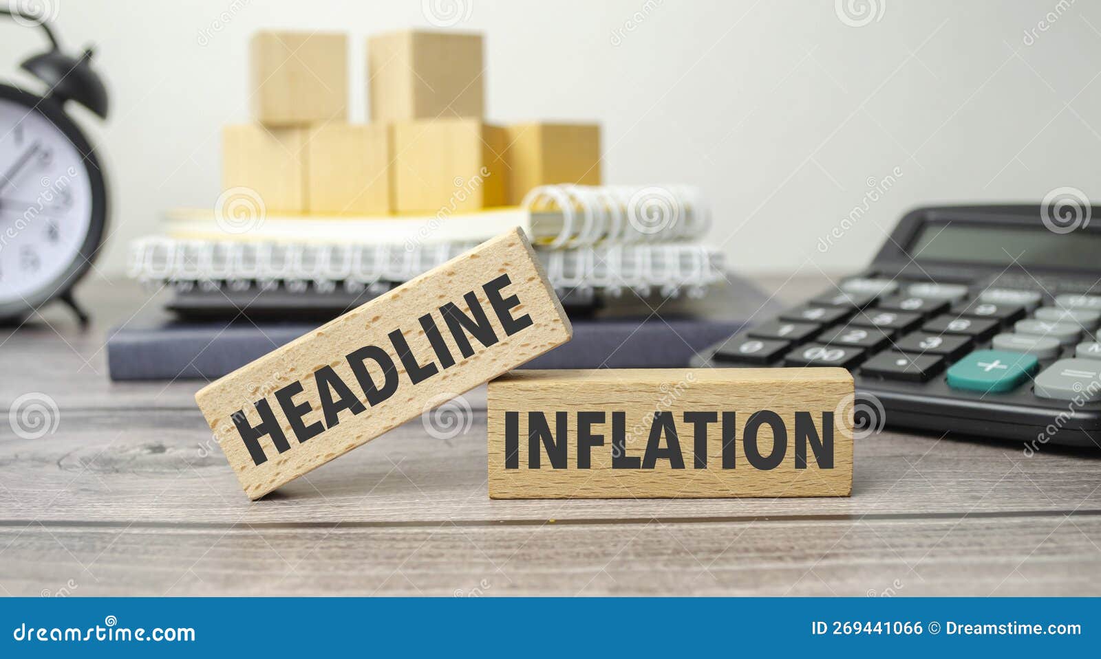 Headline Inflation on the Work Table and Alarm Clock. Stock Photo ...