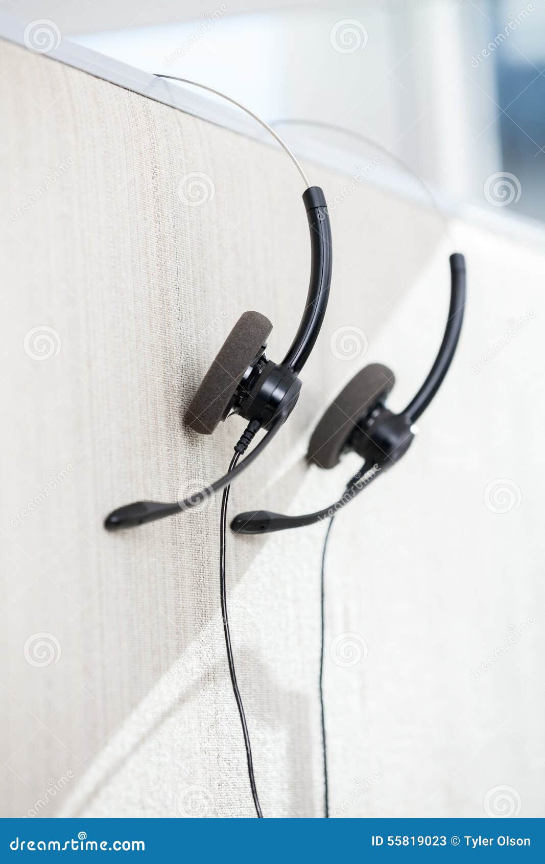 Headphones Hanging on Cubicle Partition Stock Image - Image of ...