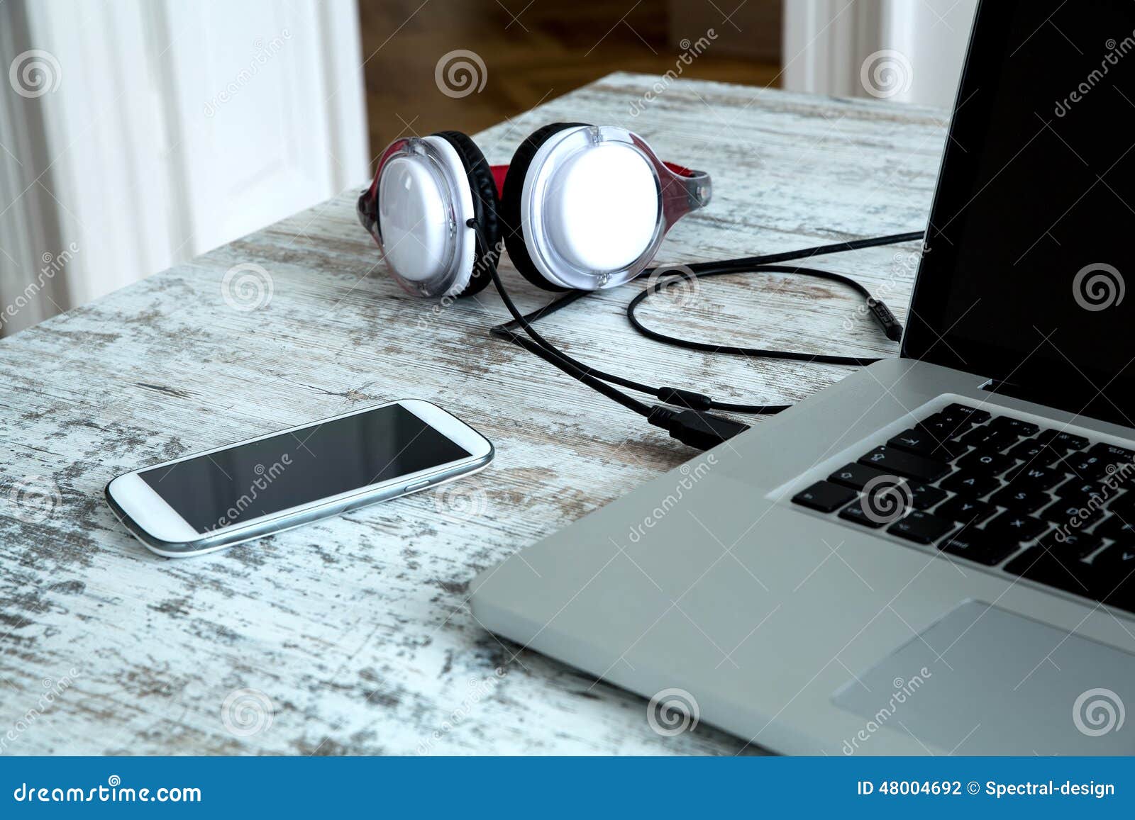 Headphones and a Laptop Computer on a Desktop Stock Photo - Image of ...