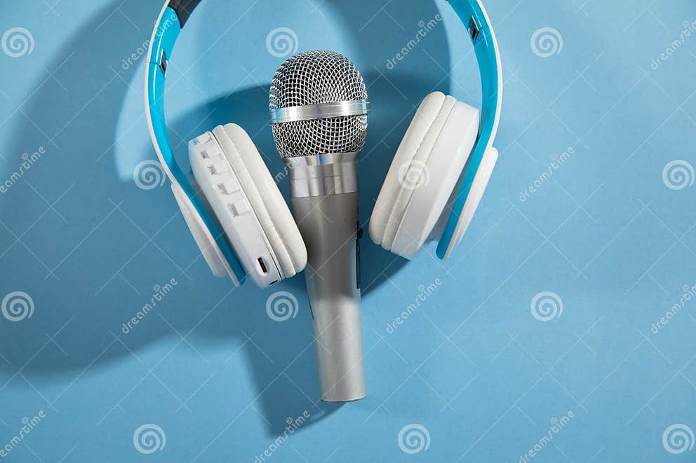 Headphones with a Microphone on the Blue Background Stock Photo - Image ...