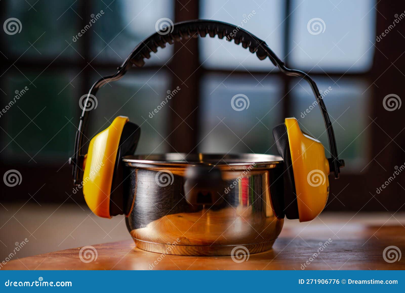 Headphones from Sound on Kitchen Pot on Wooden Table Stock Photo ...