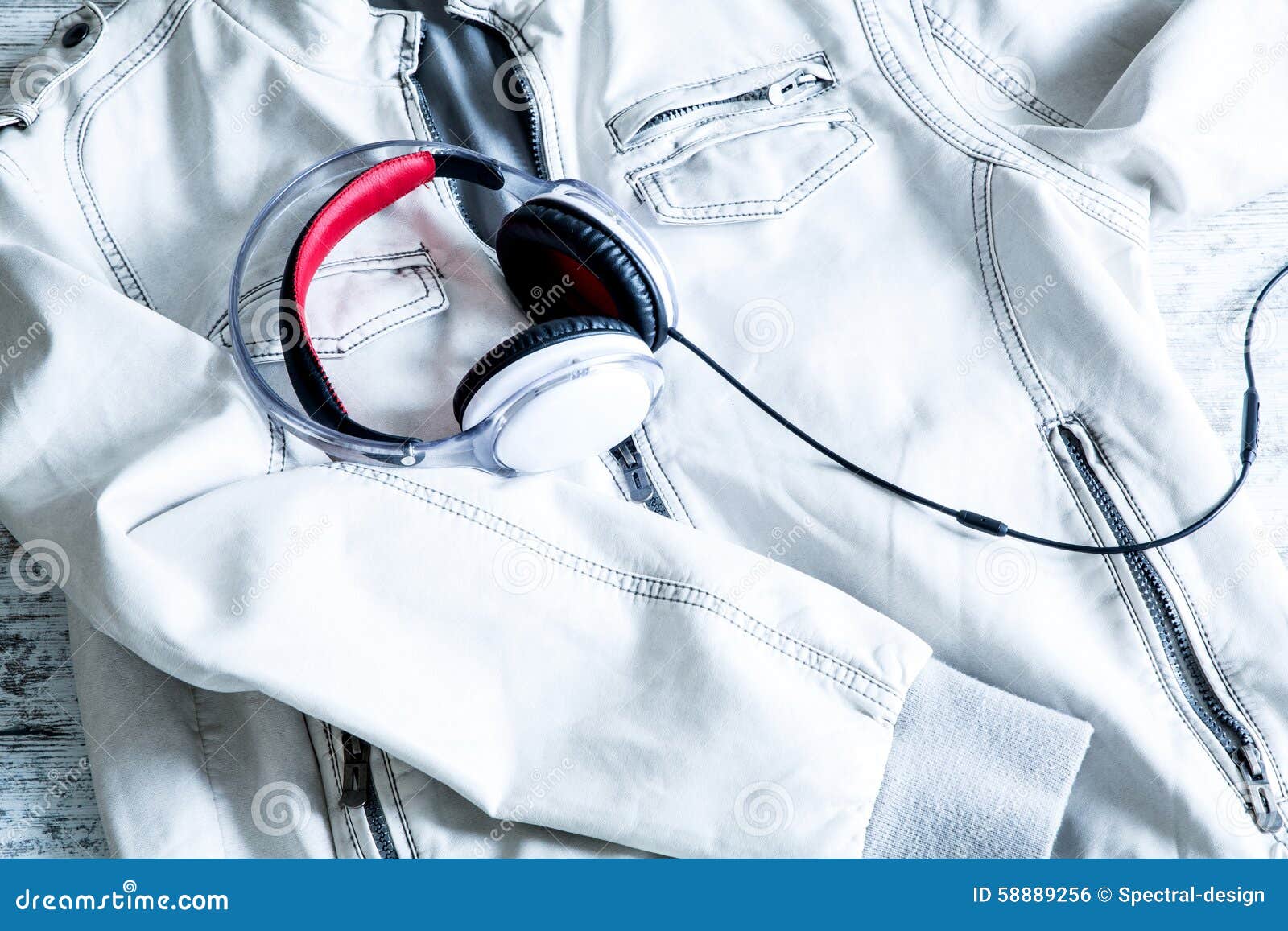 Headphones on a White Jacket Stock Photo - Image of style, jacket: 58889256