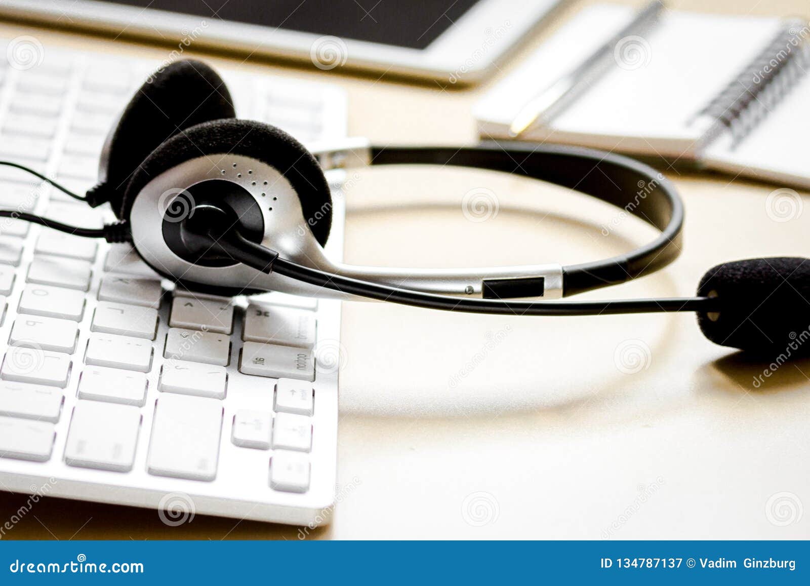 Headset and Keyboard on Workdesk for Call Center Concept Editorial ...
