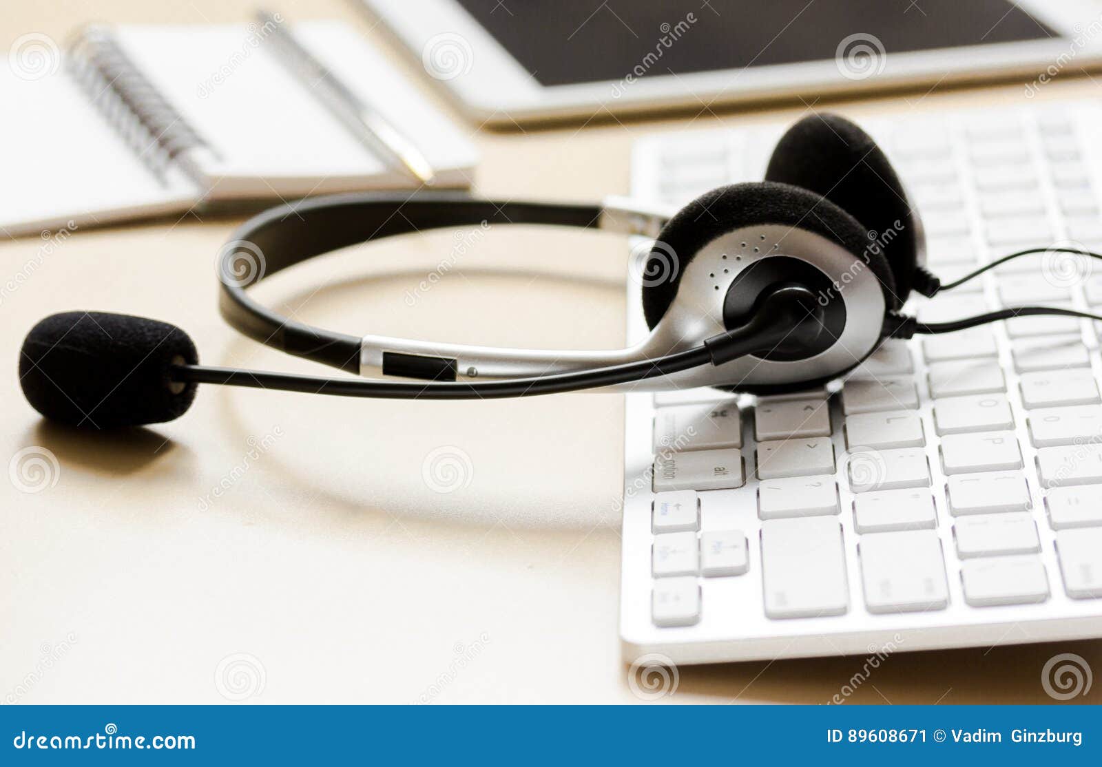 Headset and Keyboard on Workdesk for Call Center Concept Editorial ...