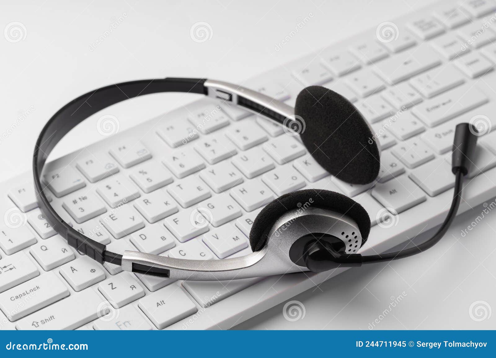 Headset on a Laptop Keyboard on Office Table Stock Image - Image of ...