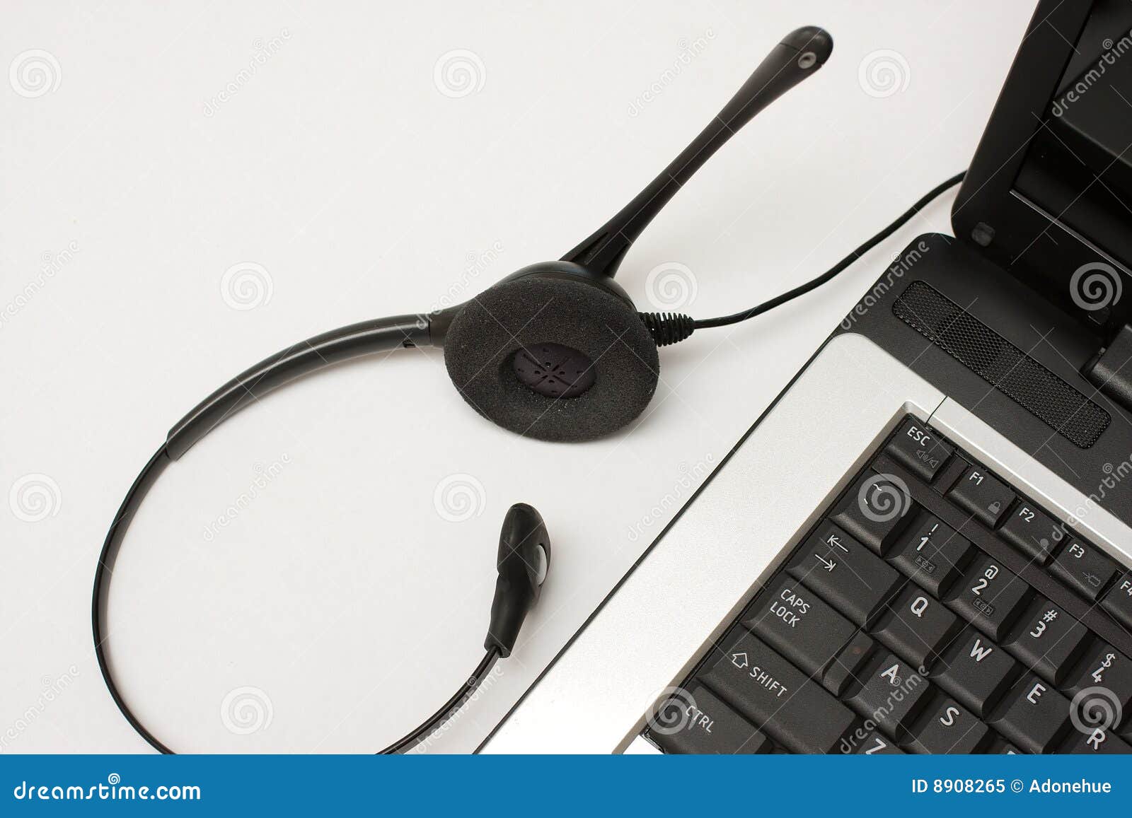 Headset next to laptop stock image. Image of silver, talk - 8908265