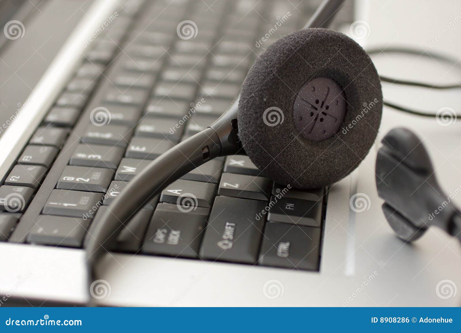 Headset next to laptop stock photo. Image of home, discuss - 8908286