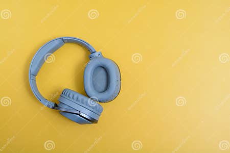 Earphones on Yellow Background. Stock Image - Image of object ...