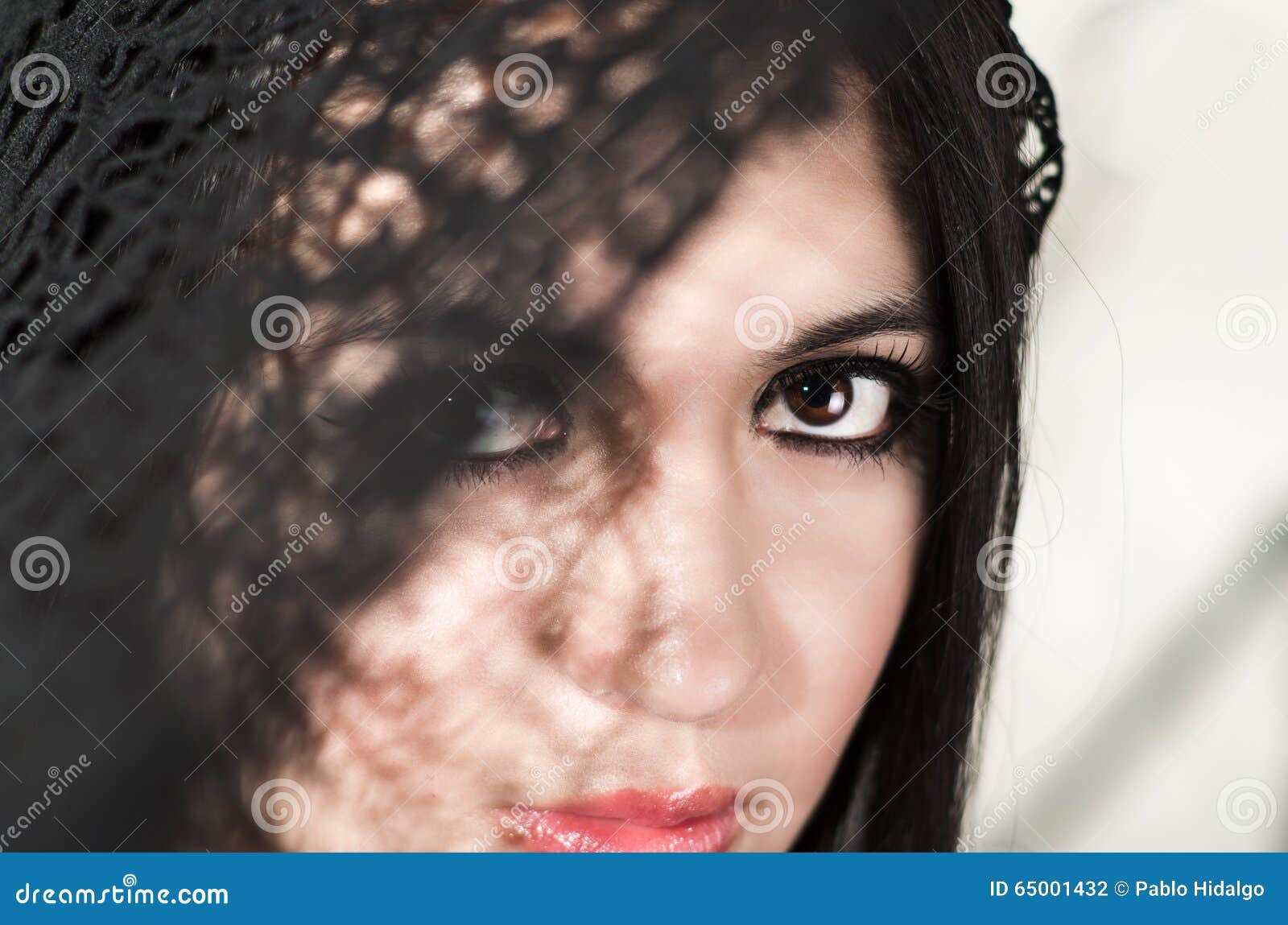 Headshot Brunette Model Using Patterned Shadows As Stock Photo - Image ...