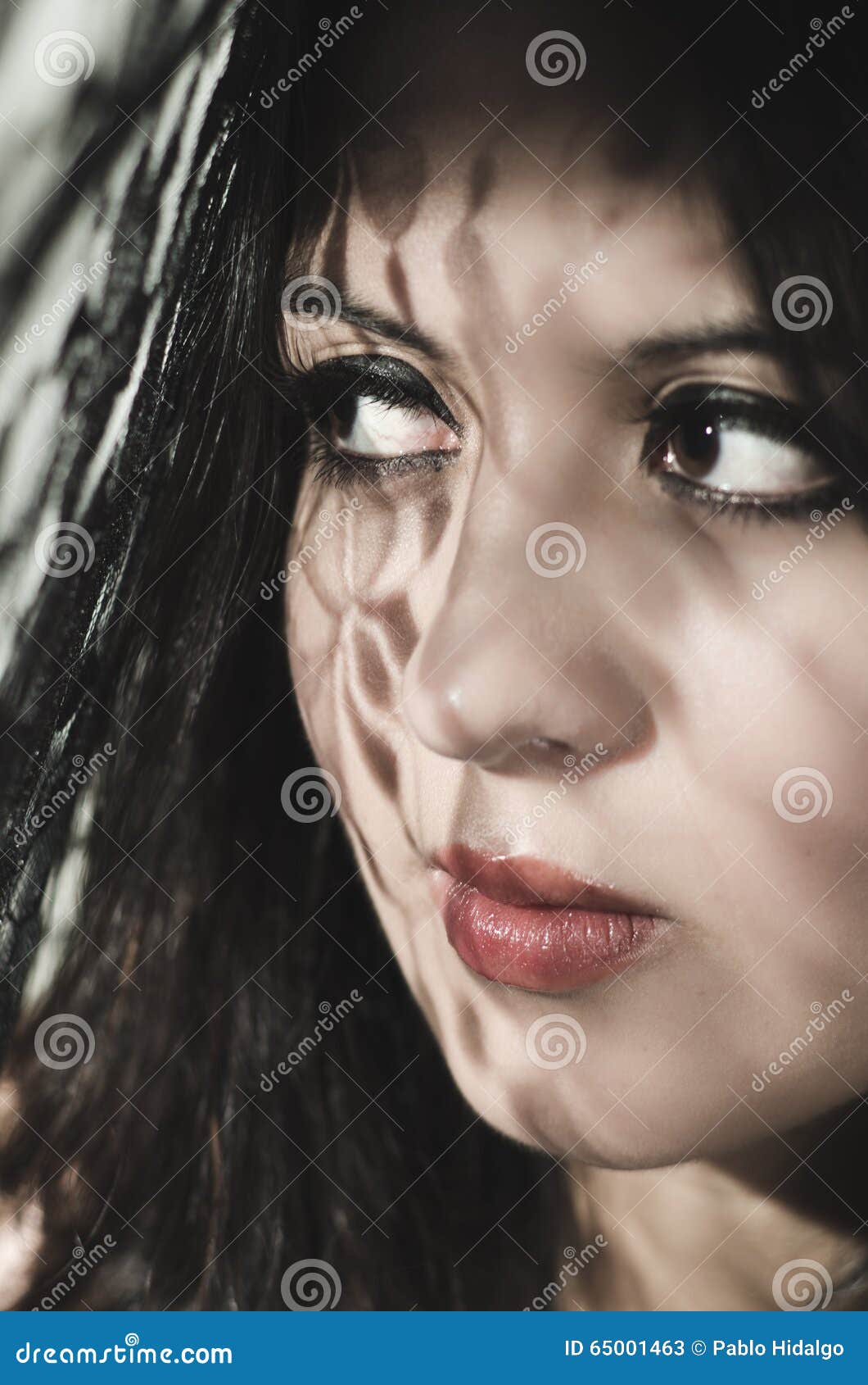 Headshot Brunette Model Using Patterned Shadows As Stock Image - Image ...