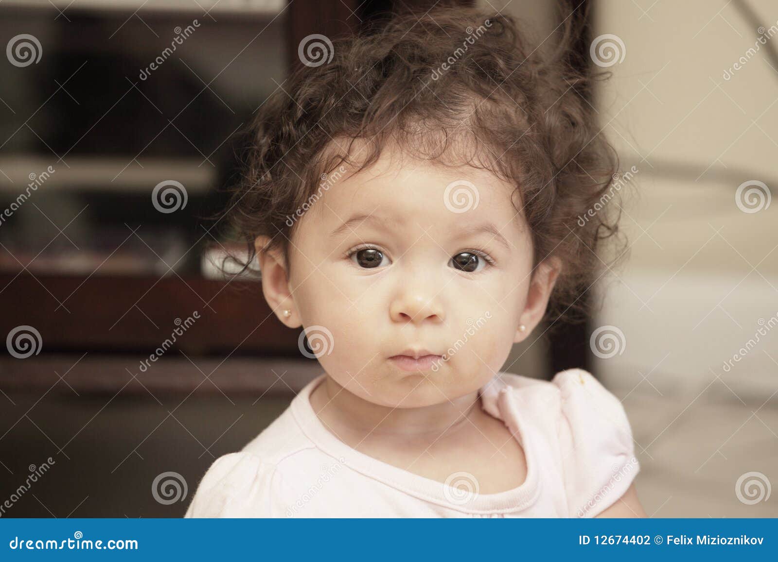 Headshot of a cute baby stock photo. Image of cute, earrings - 12674402