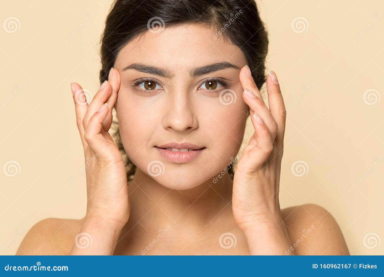 Headshot Of Indian Millennial Girl Touch Healthy Skin Stock Image
