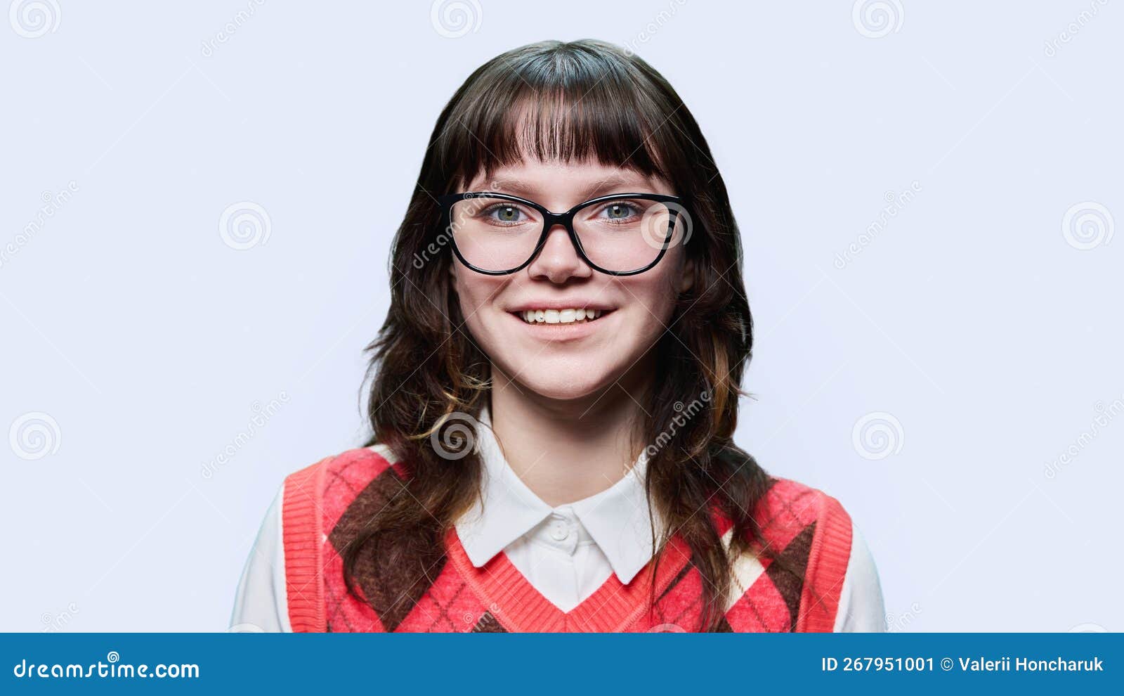 Headshot Portrait of Young Female Student Looking at Camera on Light ...
